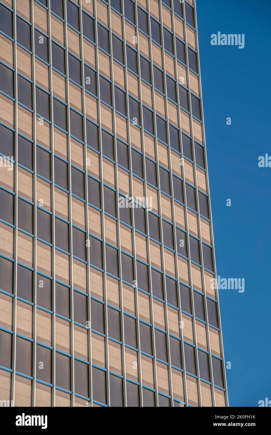 Exterior of a tall building agains tblue sky background in Tucson ...
