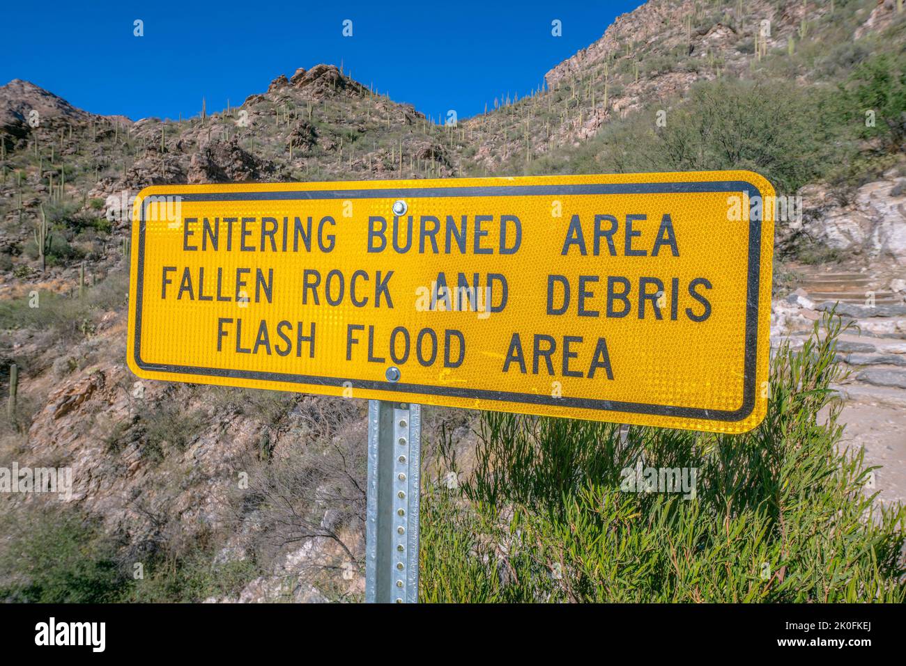 Warning sign: Entering burned area fallen rock and debris flash flood ...