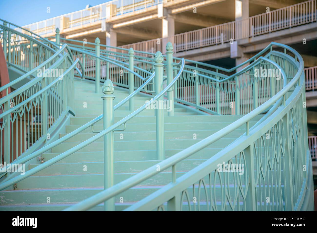 Curved green staircase outdoors at downtown Tucson, Arizona. Large sage ...