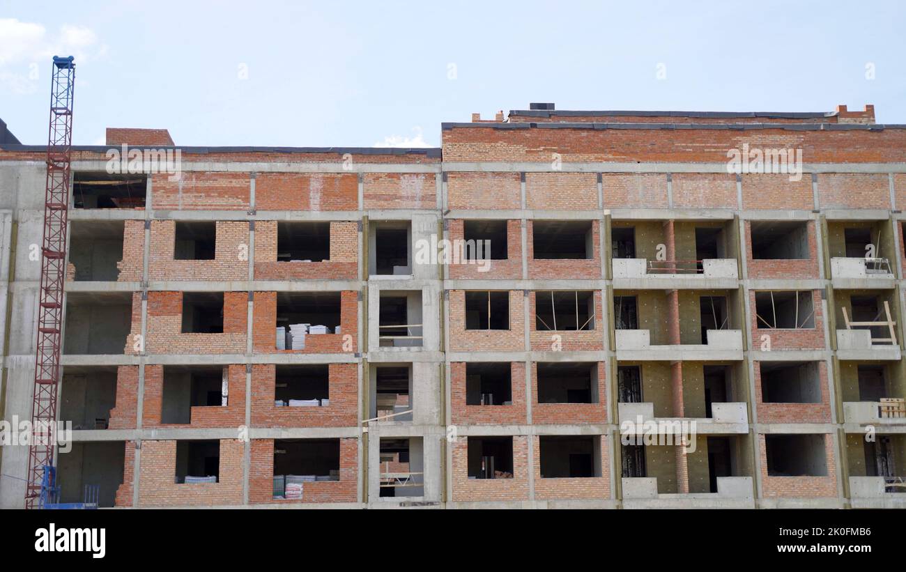 Construction of a multi-storey brick house. Stage of construction of a ...