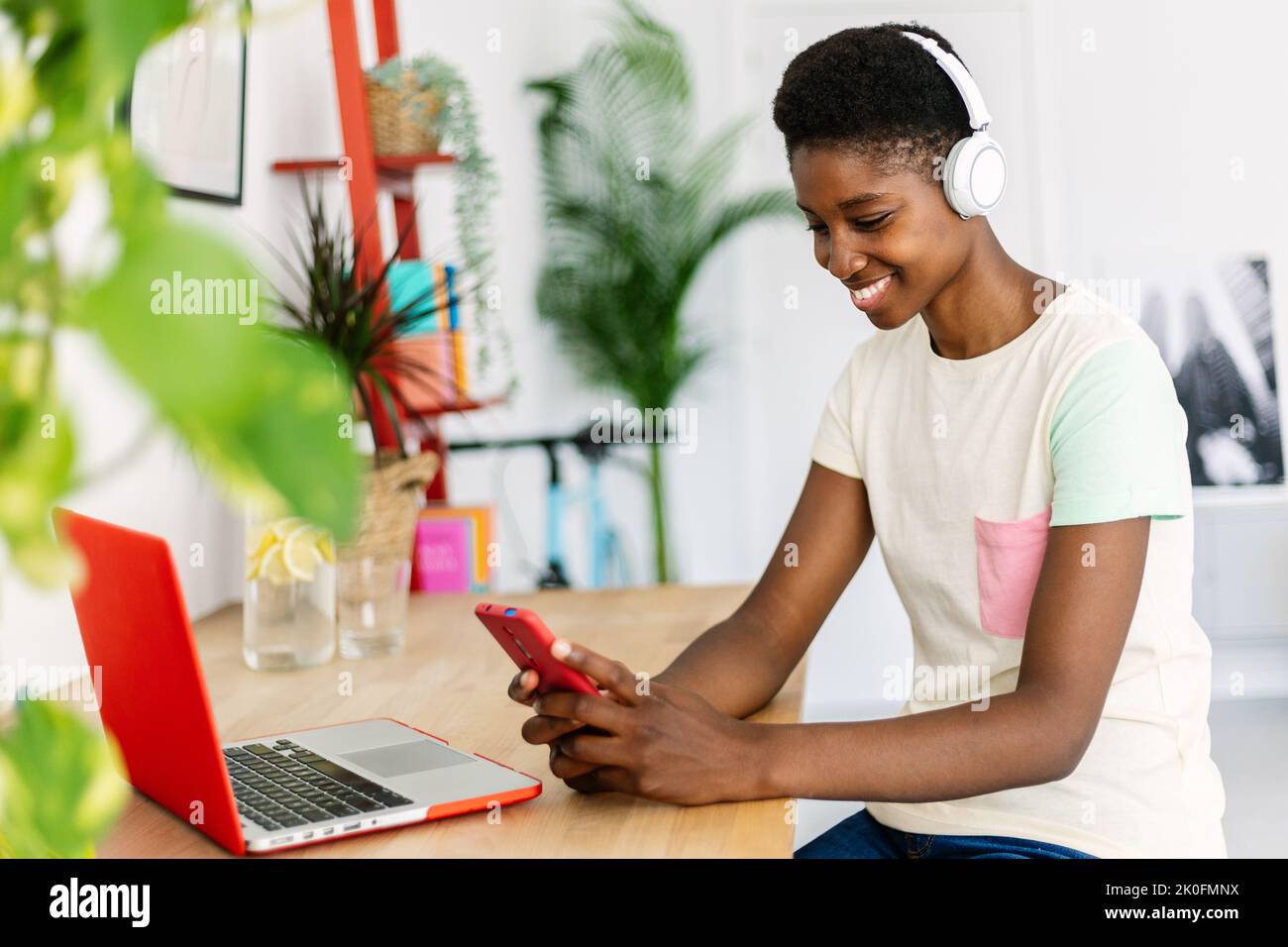 Young happy woman using headphones hi-res stock photography and images ...