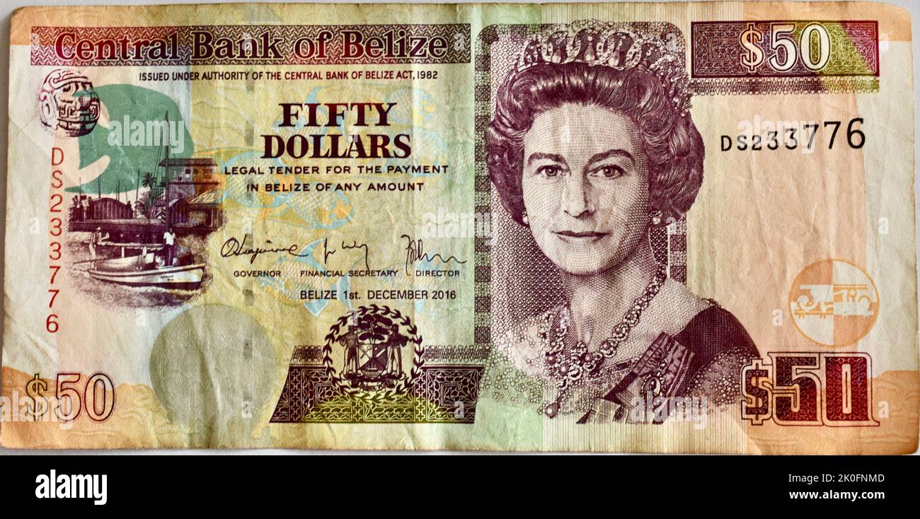 A $50 Belizean dollar bill with Queen Elizabeth II's image on it Stock ...
