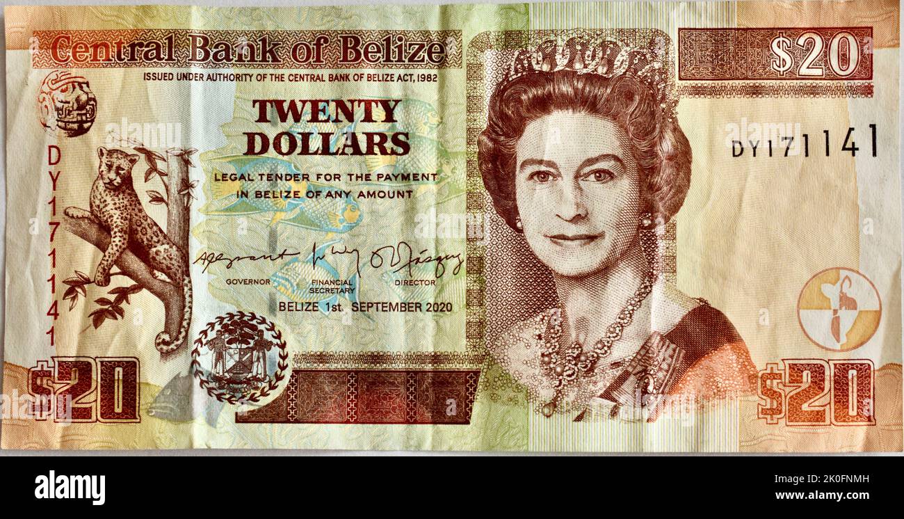 A $20 Belizean dollar bill with Queen Elizabeth II's image on it Stock ...