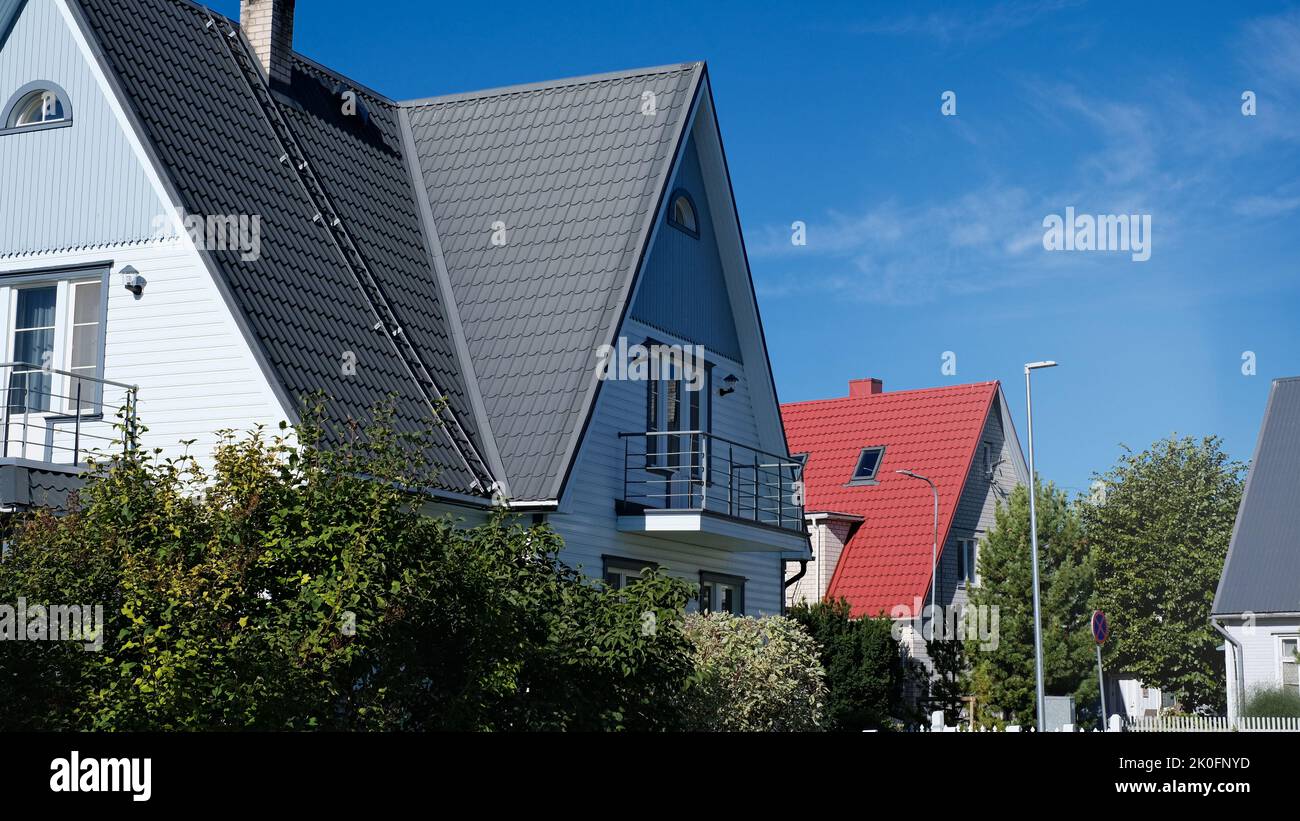 A private house of two floors with triangular roof and an area near the ...