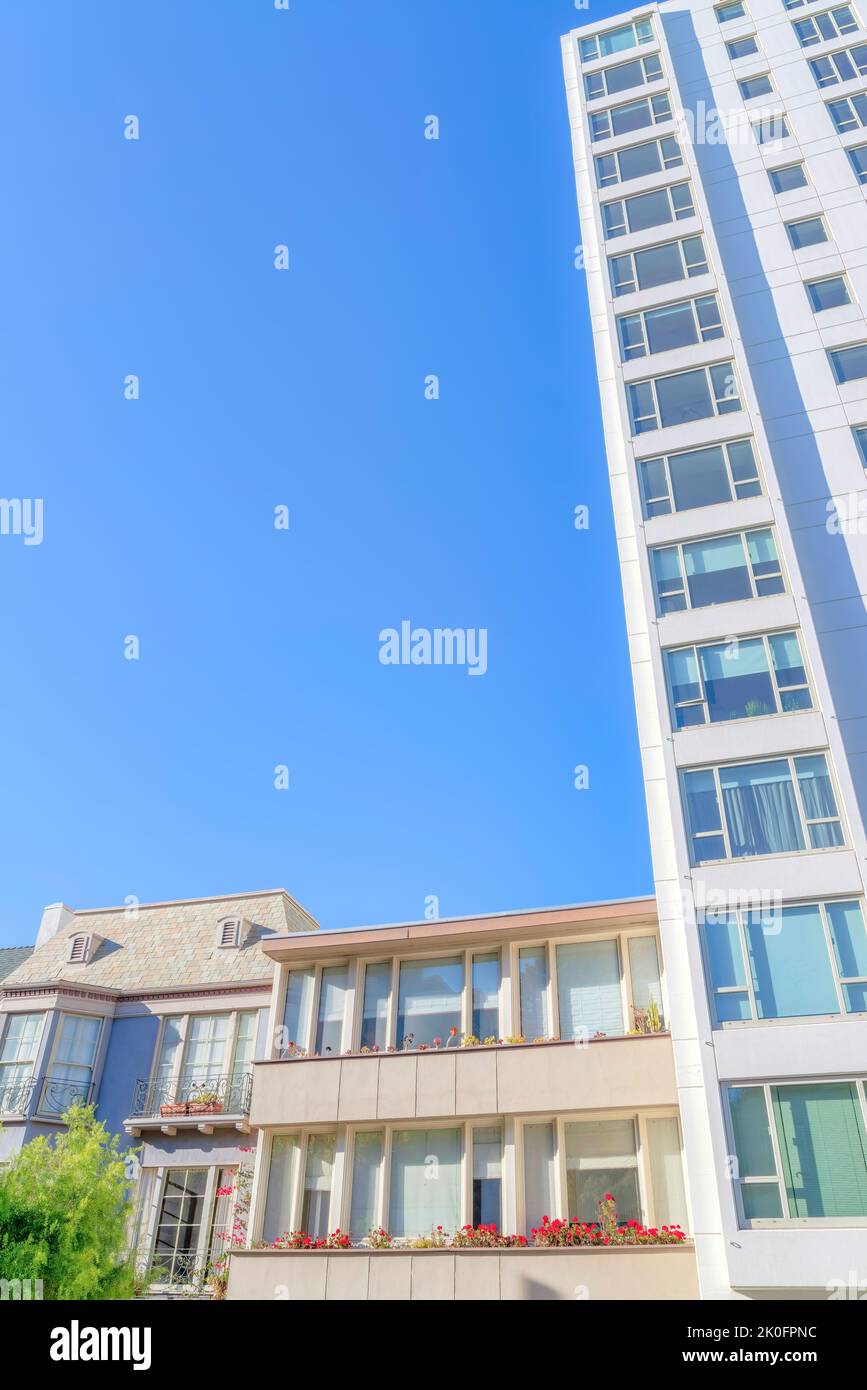 Low-rise and high-rise residential buildings against the sky at San ...