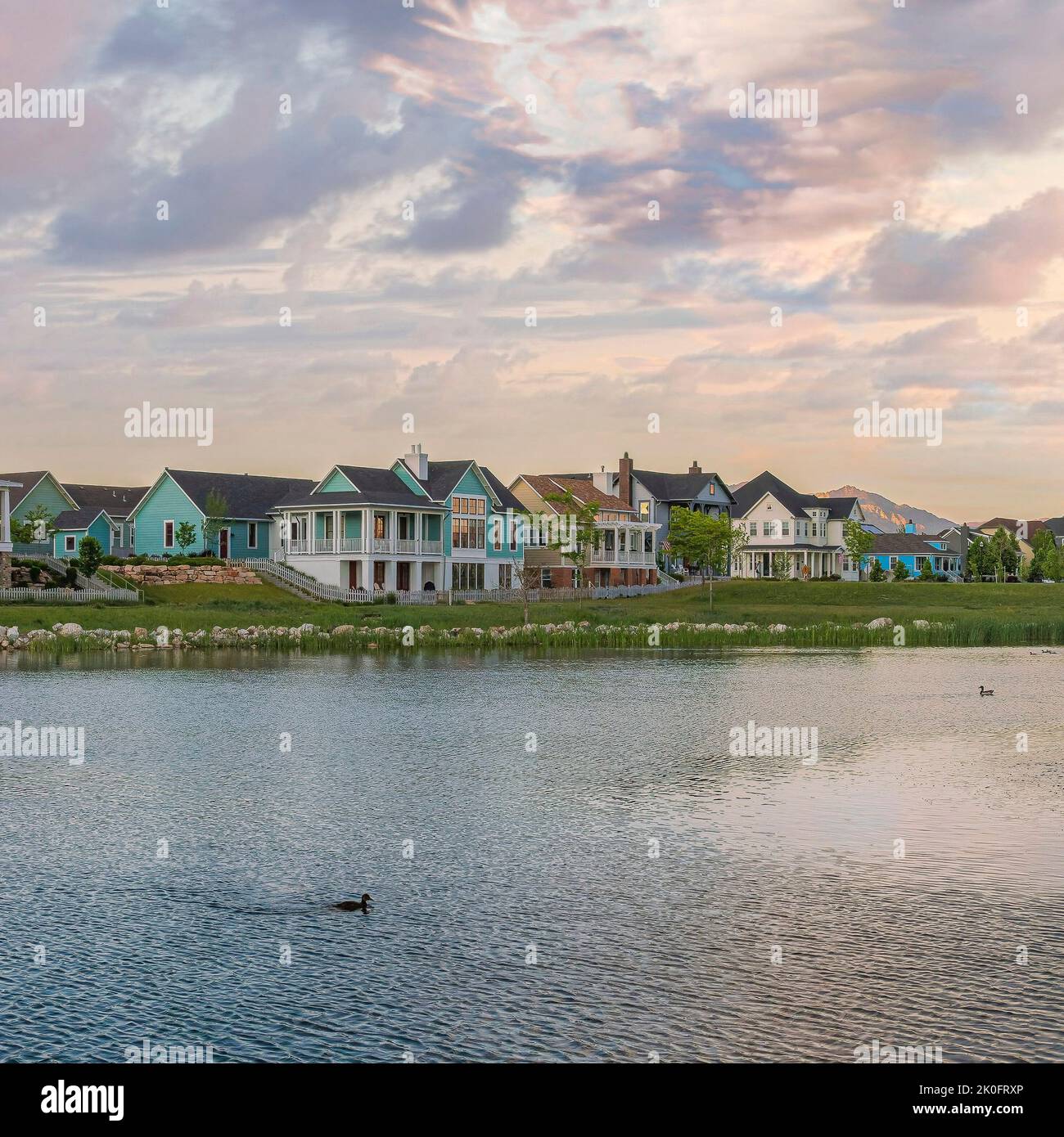 Square Puffy clouds at sunset Panoramic view of Oquirrh Lake with ...