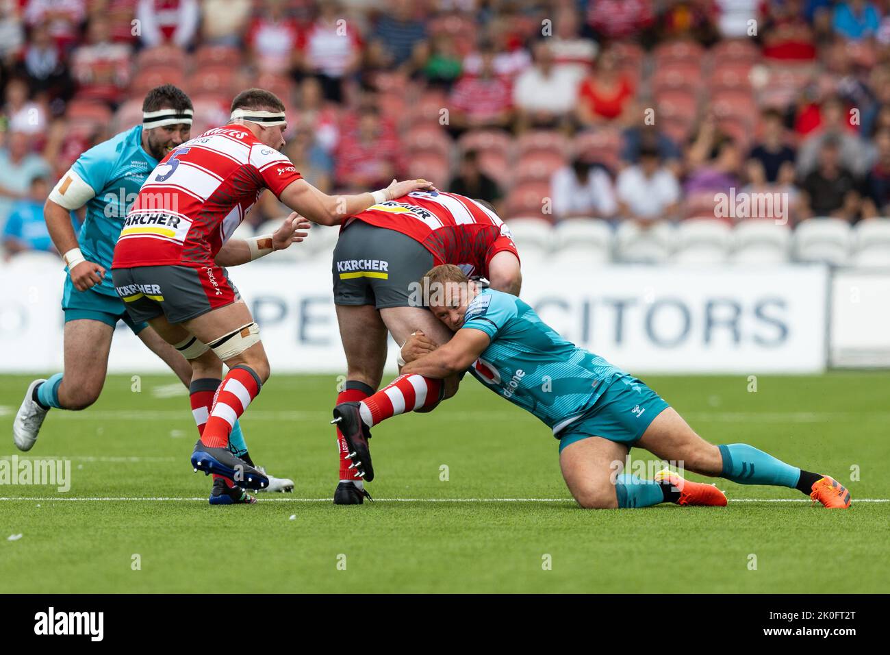 Tom Cruse of Wasps Rugby tackles Fraser Balmain of Gloucester Rugby ...