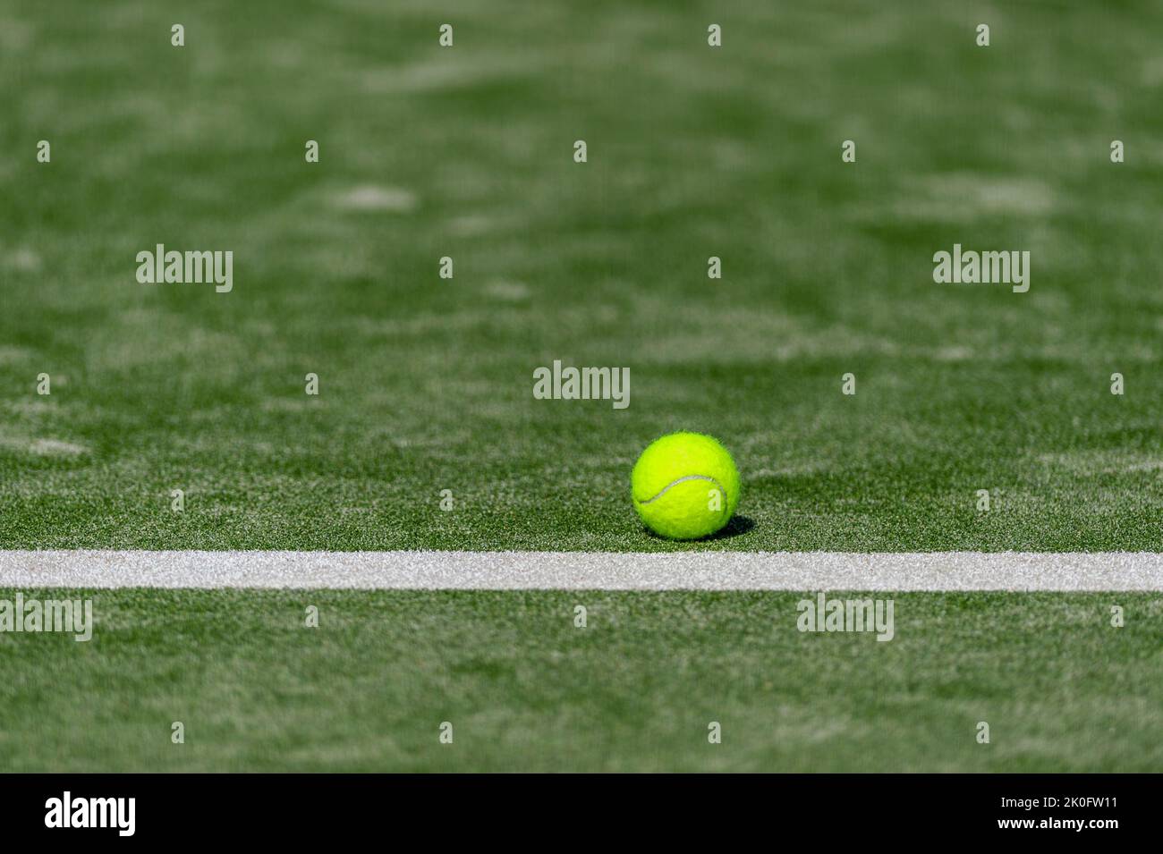 Tennis ball on a tennis court. Horizontal sport theme poster, greeting ...