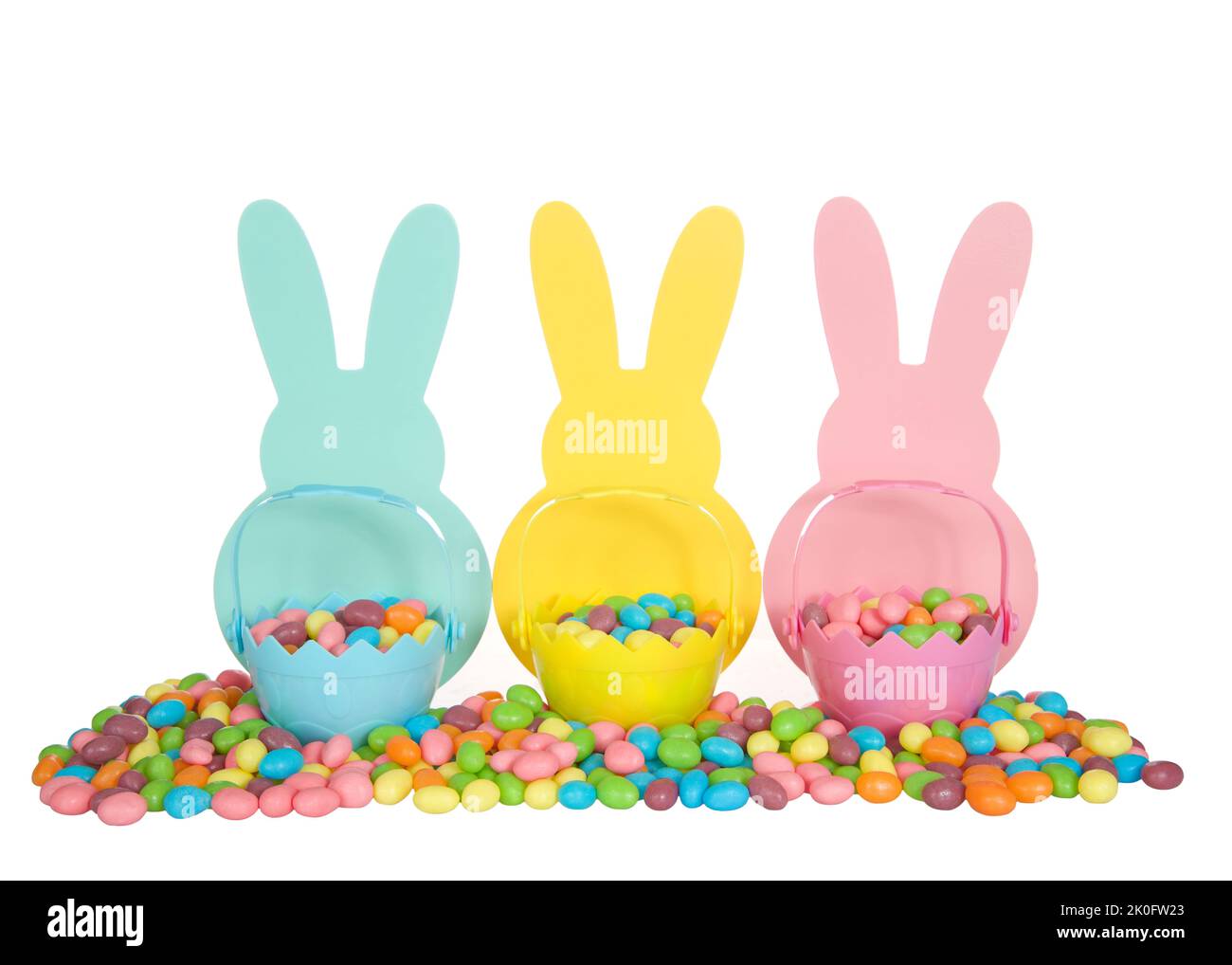 Three colorful wooden Easter Bunny Silhouettes in blue, yellow and pink ...