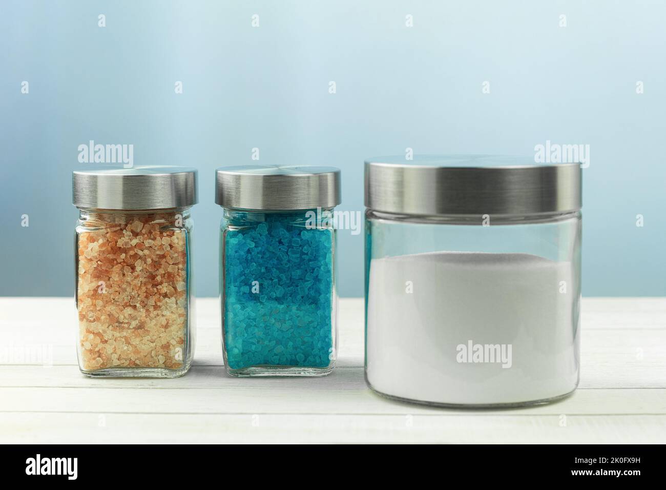 Salt in glass jars, different types of salt. Spa concept. Salt for ...