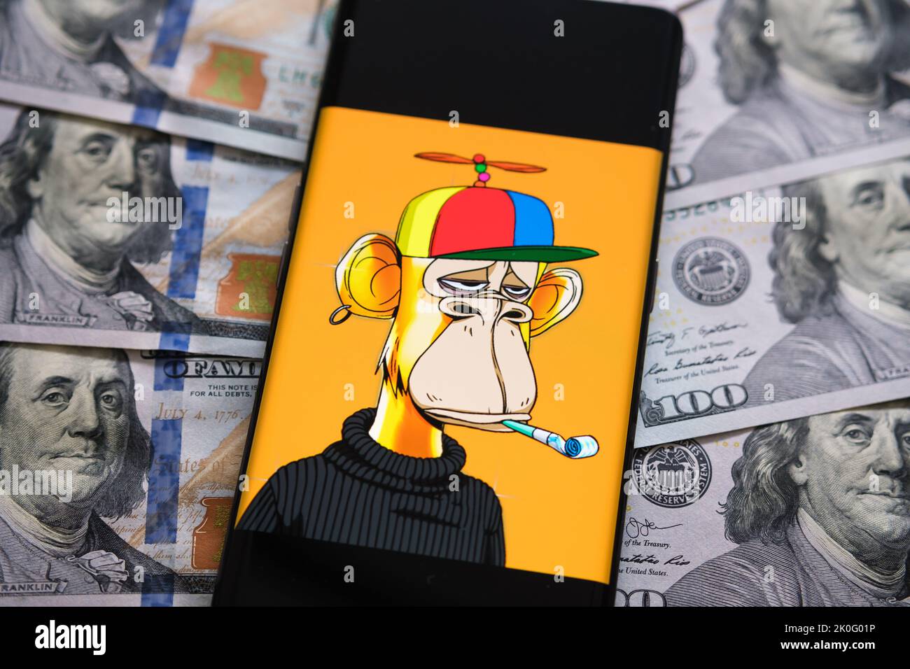 Bored Ape #8817 NFT seen on the smartphone screen placed on pile of ... Bored Ape #8817 NFT seen on the smartphone screen placed on pile of ...