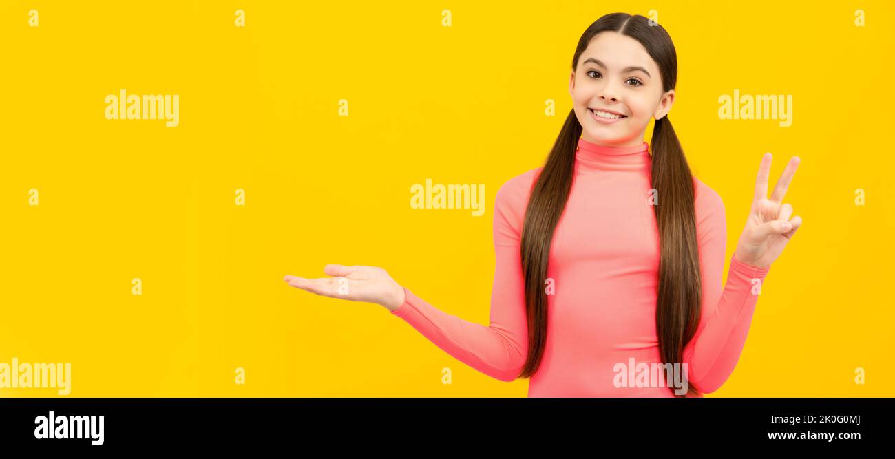 product proposal. peace. kid presenting product, copy space. pretty ...