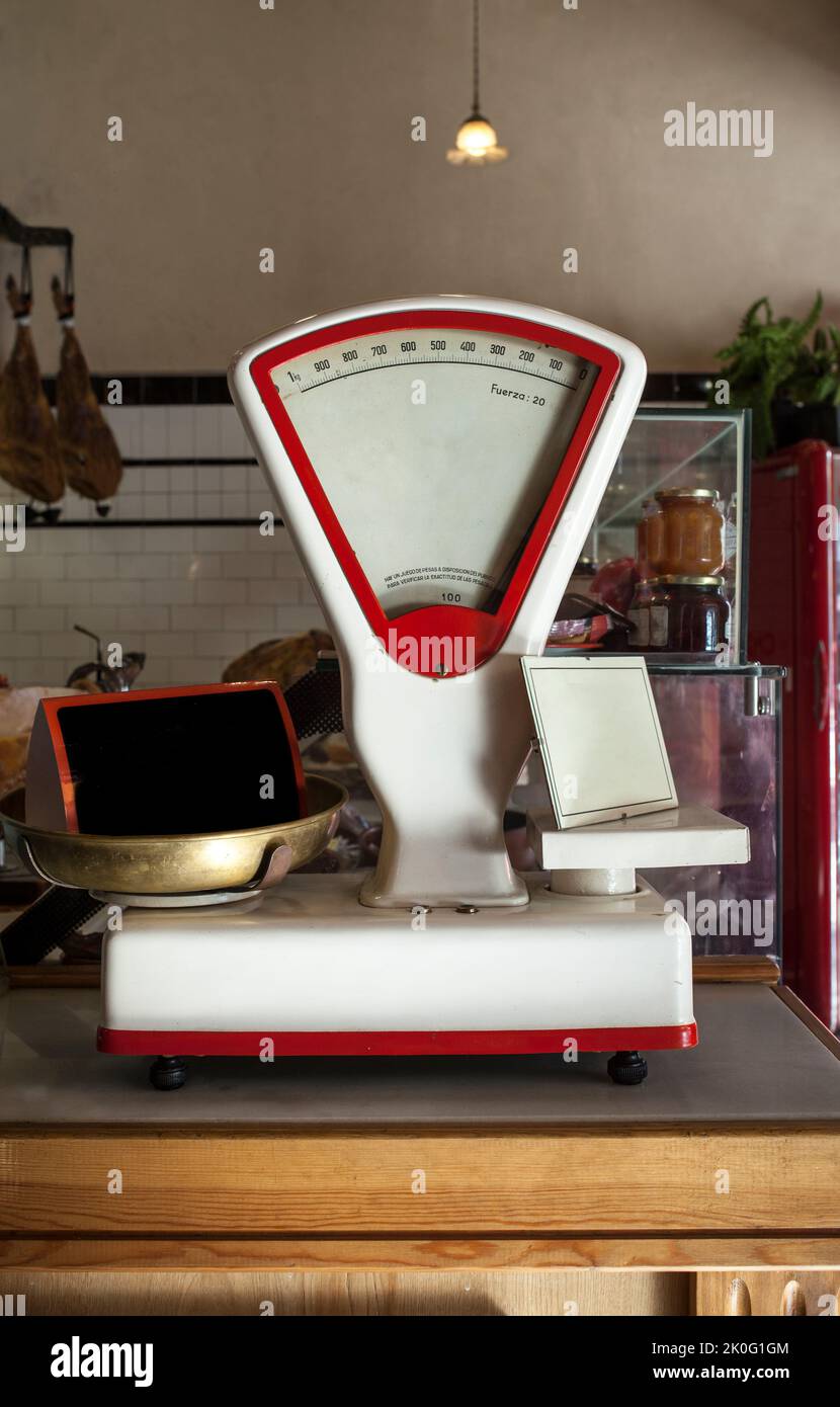 Old white scale over wooden grocery counter. Vintage background Stock ...