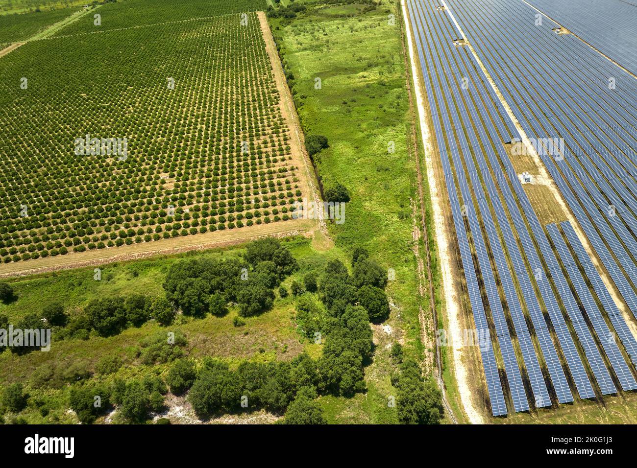 Aerial view of sustainable electric power plant between agricultural ...