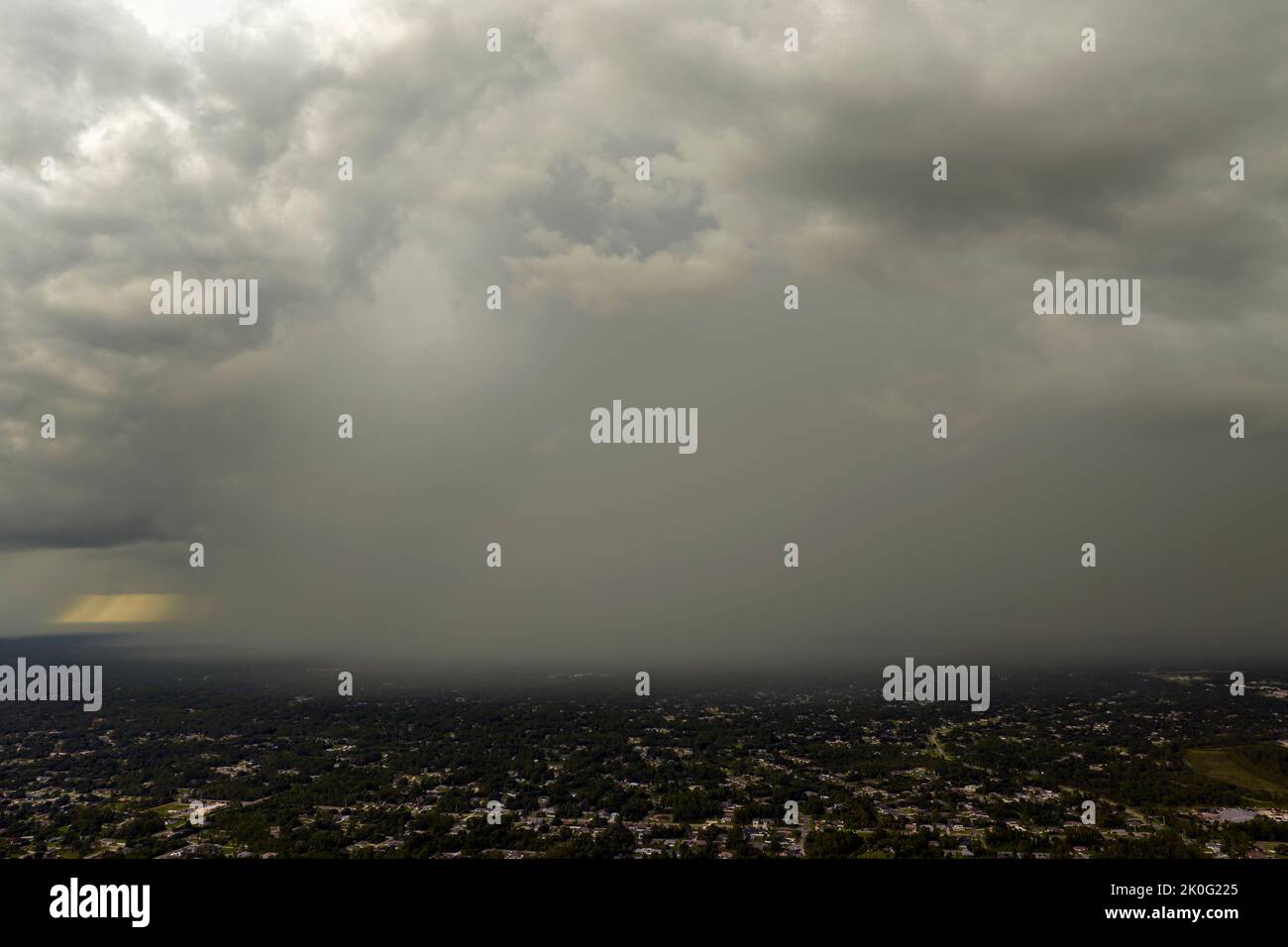 Dark stormy clouds forming on gloomy sky during heavy rainfall season ...