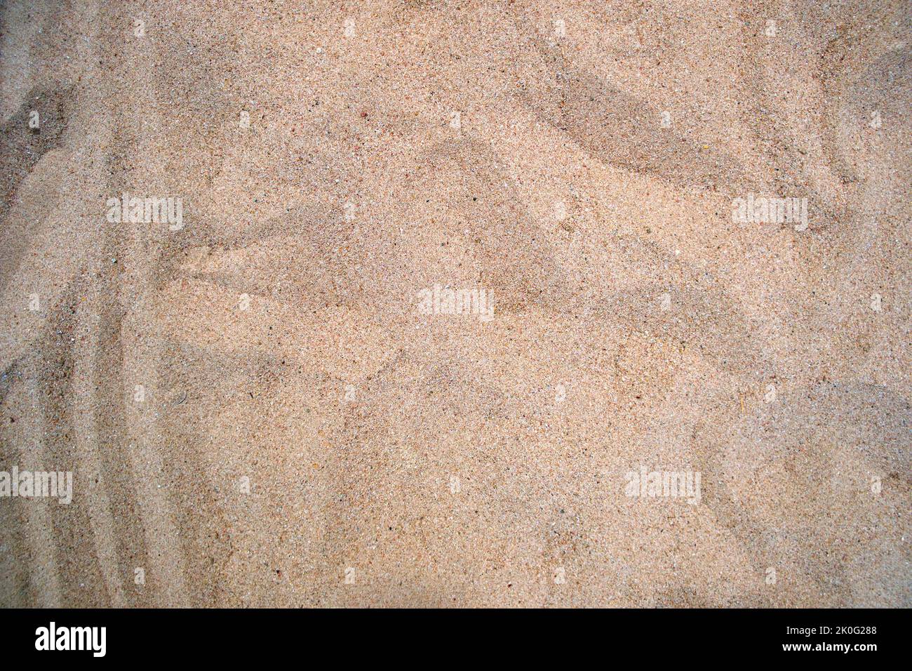 Flat view of clean yellow sand surface covering seaside beach. Sandy ...
