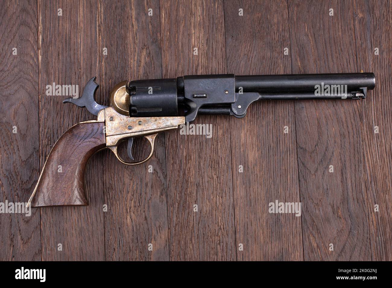 Old West gun - Percussion Army Revolver on wooden table Stock Photo - Alamy