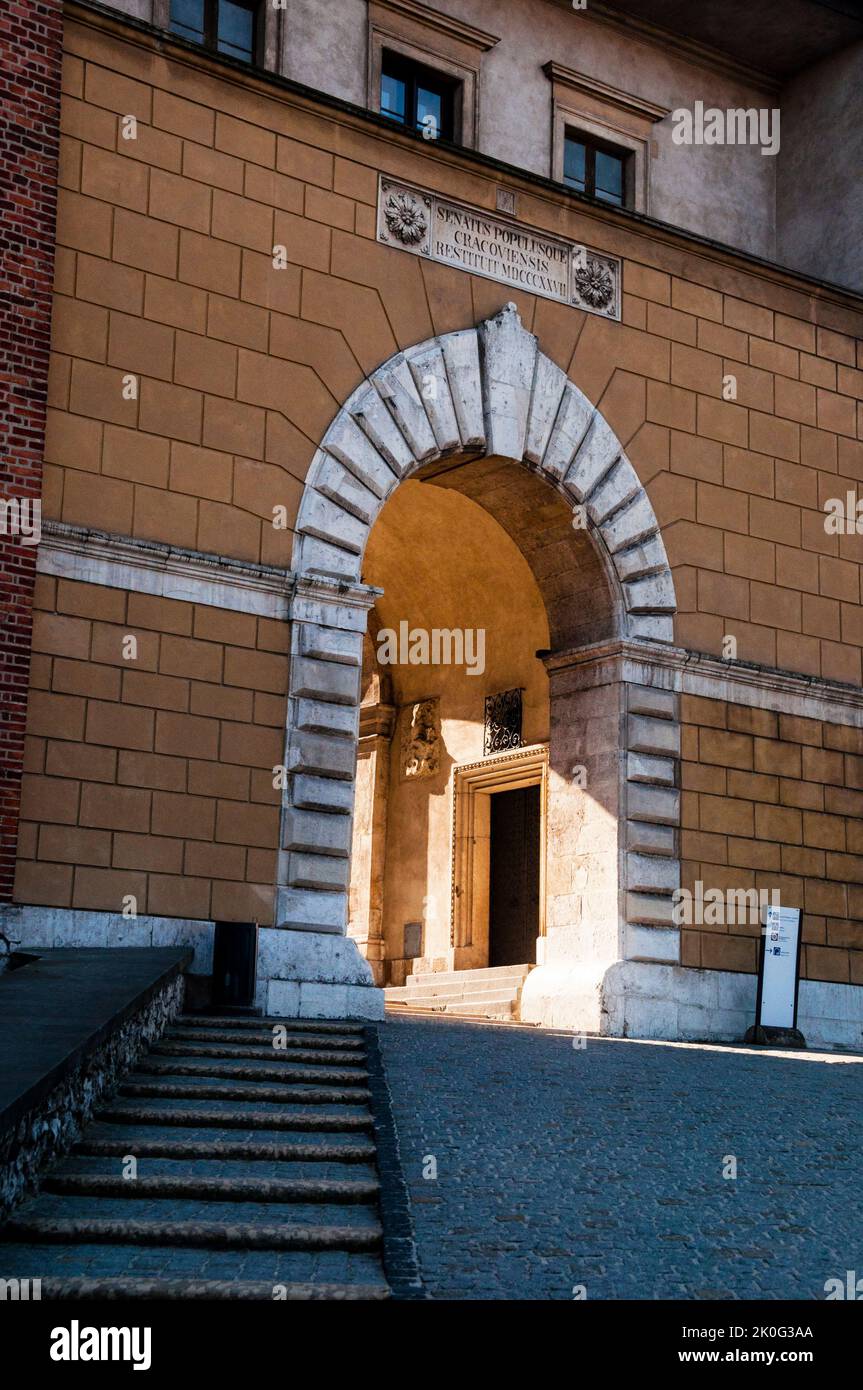 Romanesque arched gateway entrance Waza Gate at Wawel Castle in Krakow ...