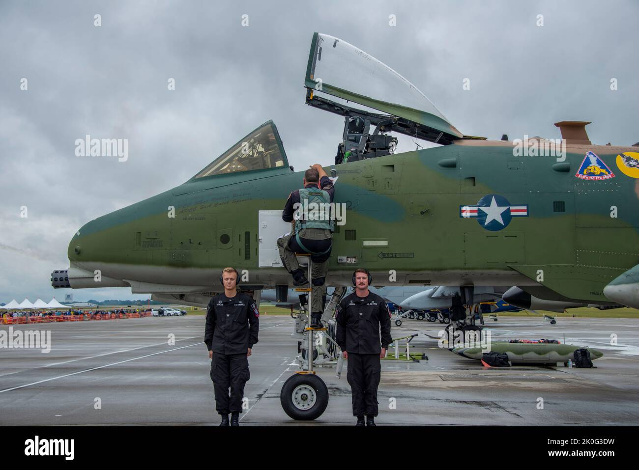 Maj. Haden Fullam, middle, the A-10 Demonstration Team pilot, climbs ...