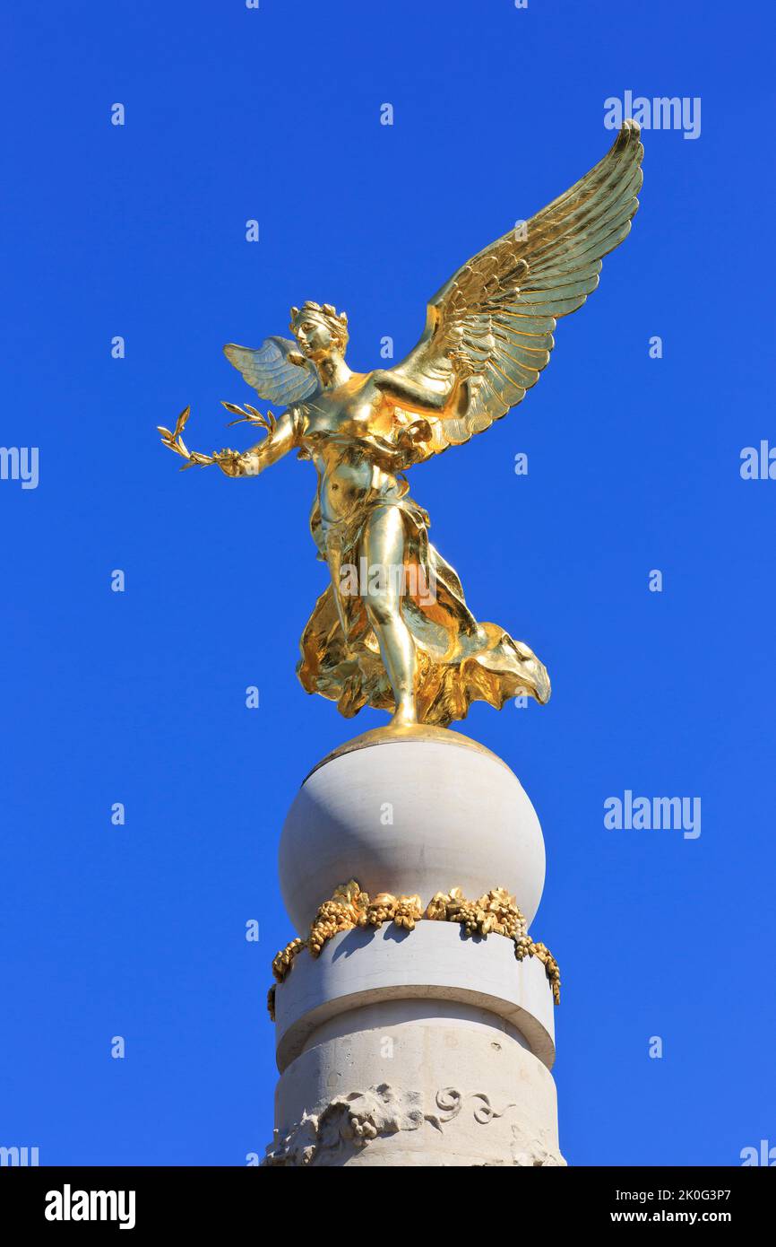 Gilded statue of an angel on top of the Subé Fountain (1906) at Place ...