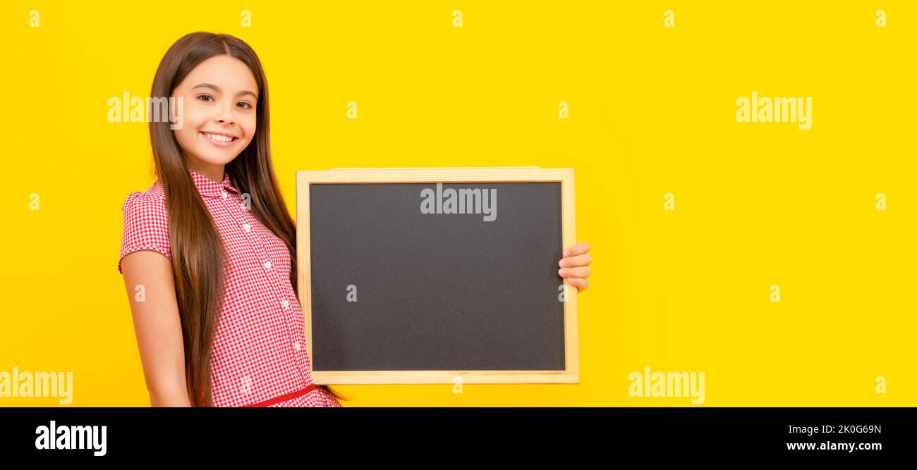 cheerful teen girl hold blackboard. child advertising. back to school ...