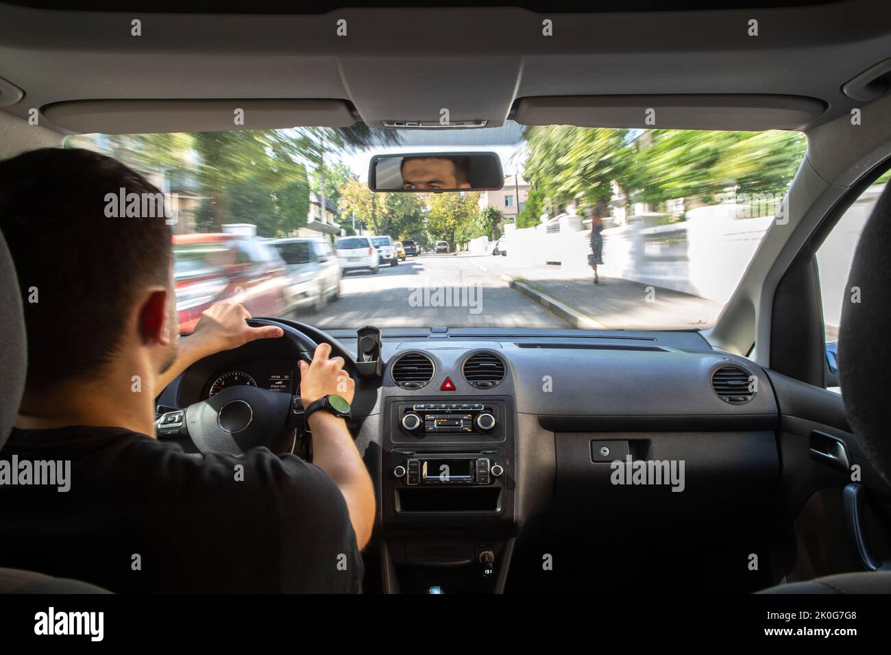 Hands on the wheel when driving at high speed from inside the car Stock Photo - Alamy