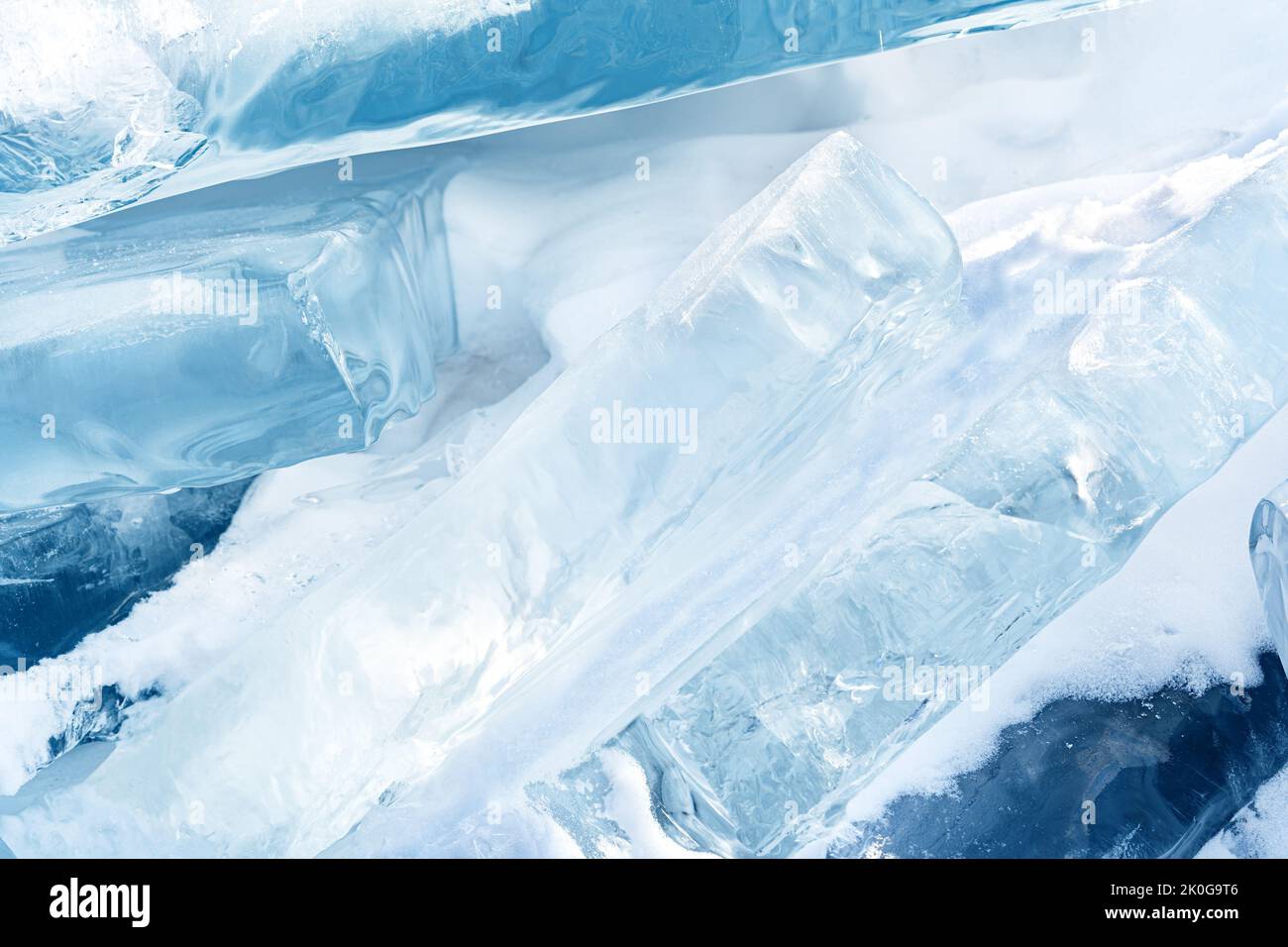 Ice hummocks on Baikal Lake. Transparent blue ice floe at sunset ...