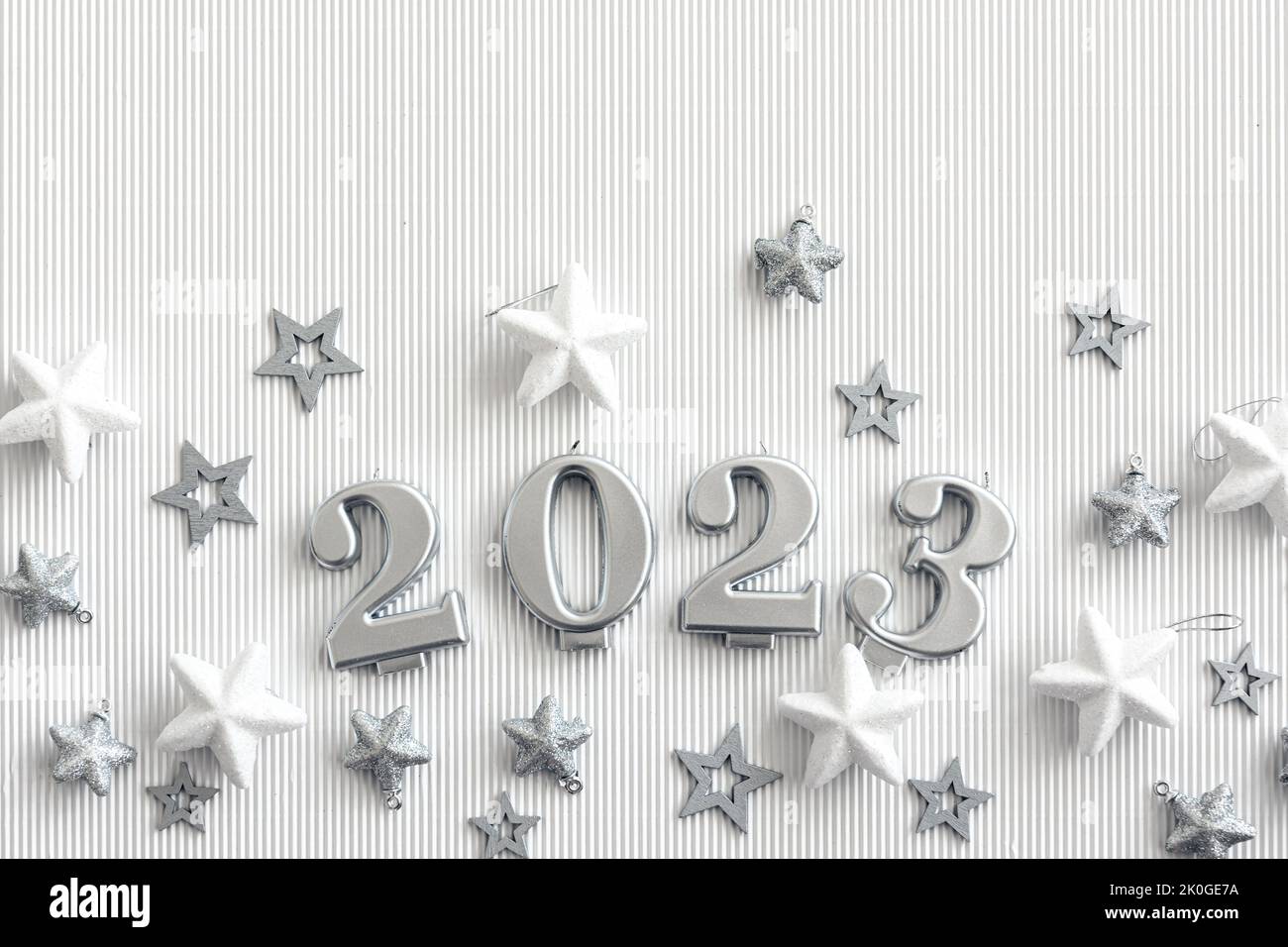 Christmas background with numbers 2023 and decor on a white background ...