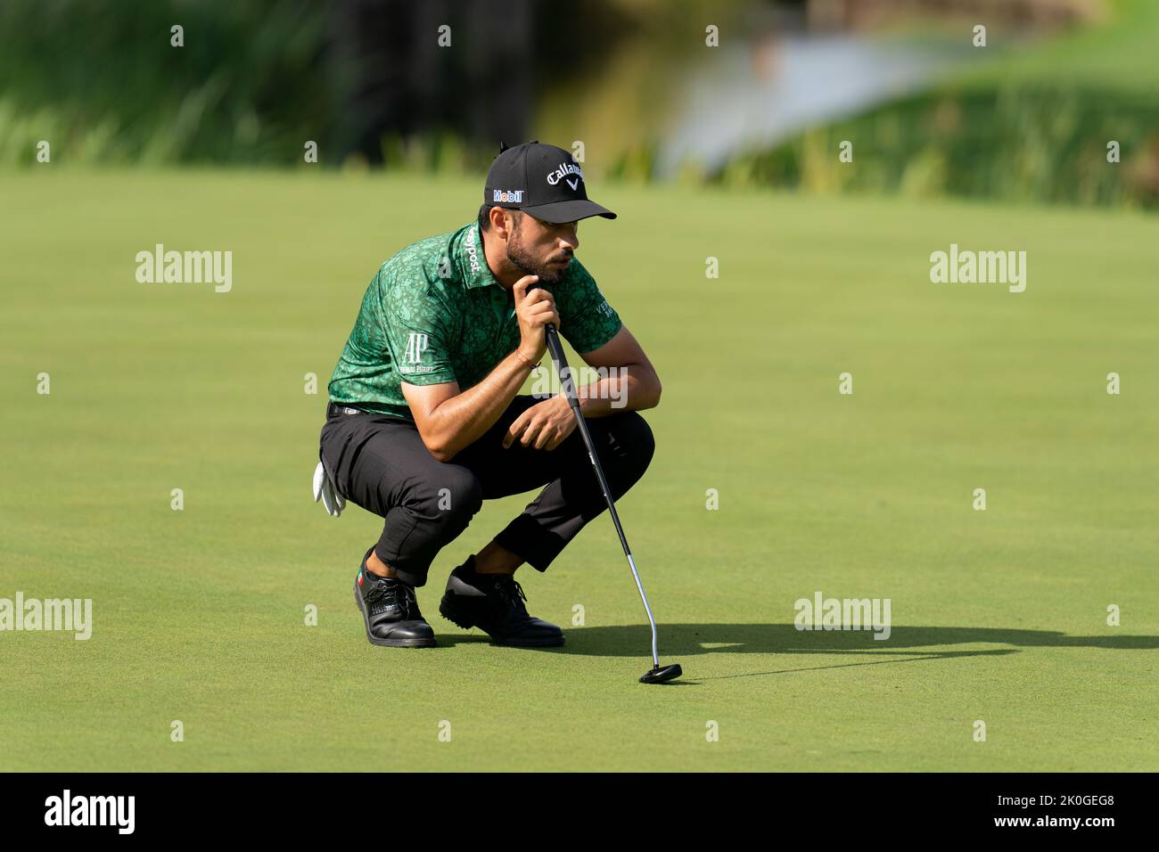Abraham Ancer (MEX) lines up a putt on the 18th green during the BMW ...