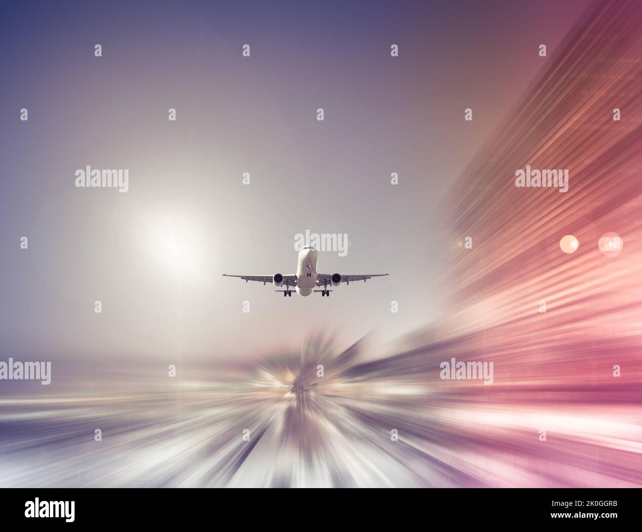 Big airplane in sky on blurred background Stock Photo - Alamy