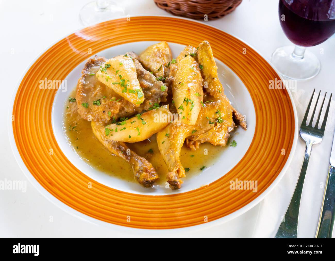Picante de pollo, spicy chicken with pears Stock Photo - Alamy