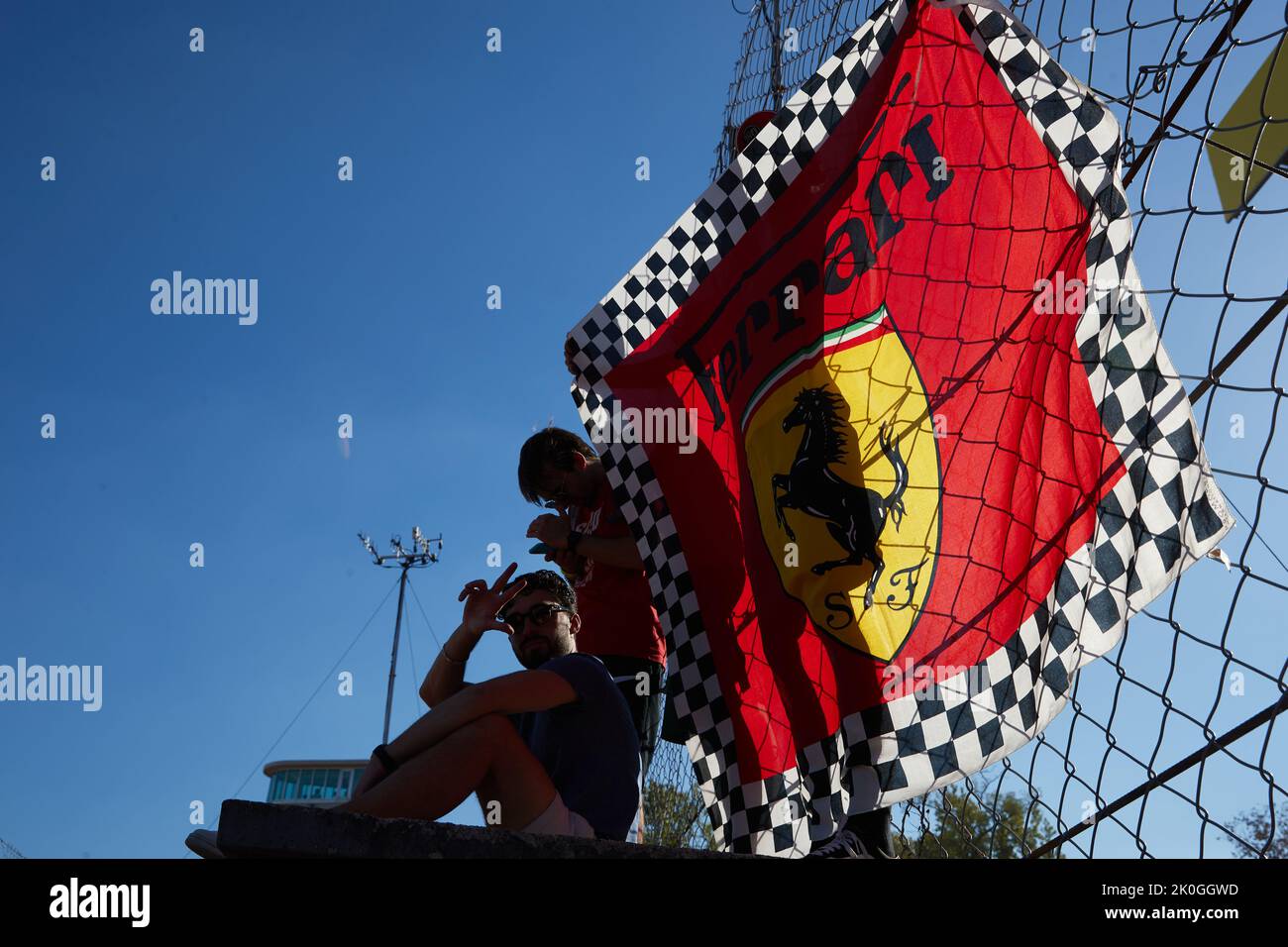 Monza, Italy. 11th Sep, 2022. Supporters show a Ferrari flag after the ...