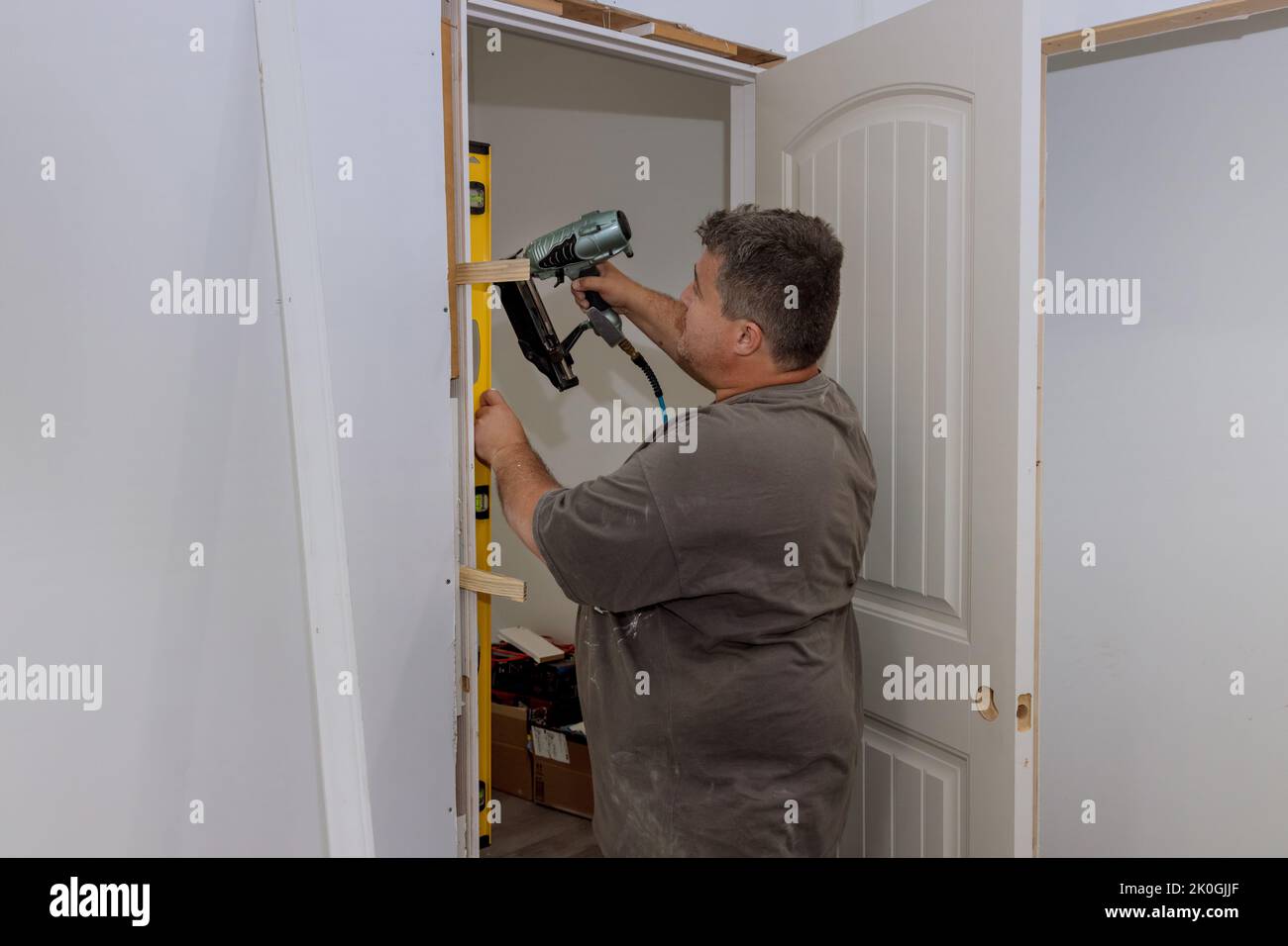 During the installation of interior doors in a new house, a trim ...