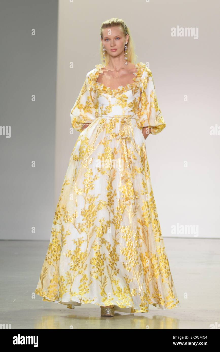 A model walks the runway at the Badgley Mischka Spring 2023 Runway Show ...