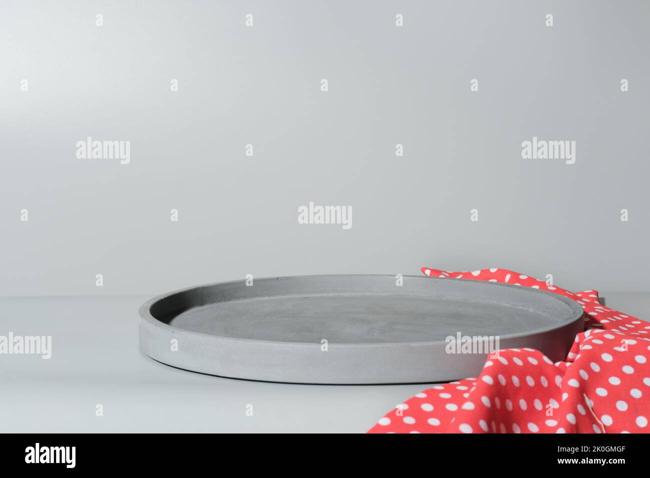 grey concrete tray made of cement as stand under plate. empty scene for ...