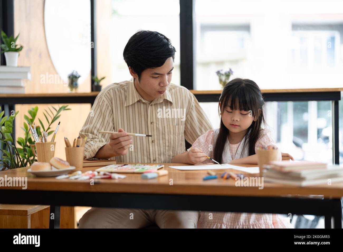 Asian female children drawing hi-res stock photography and images - Alamy