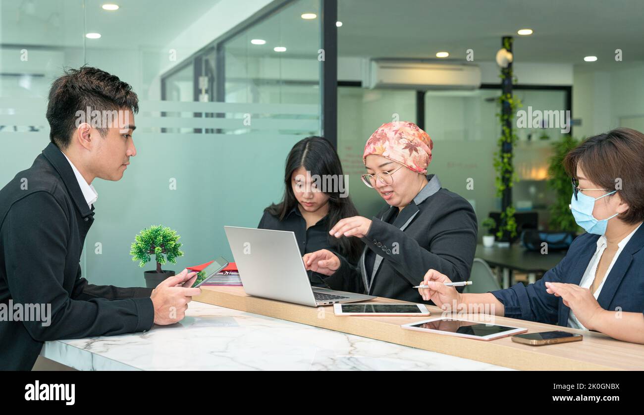 Group of Asian office business people working together in a modern co ...
