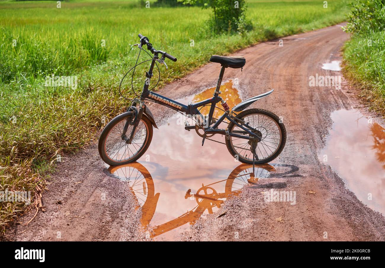 Puddle reflection in road hi-res stock photography and images - Alamy