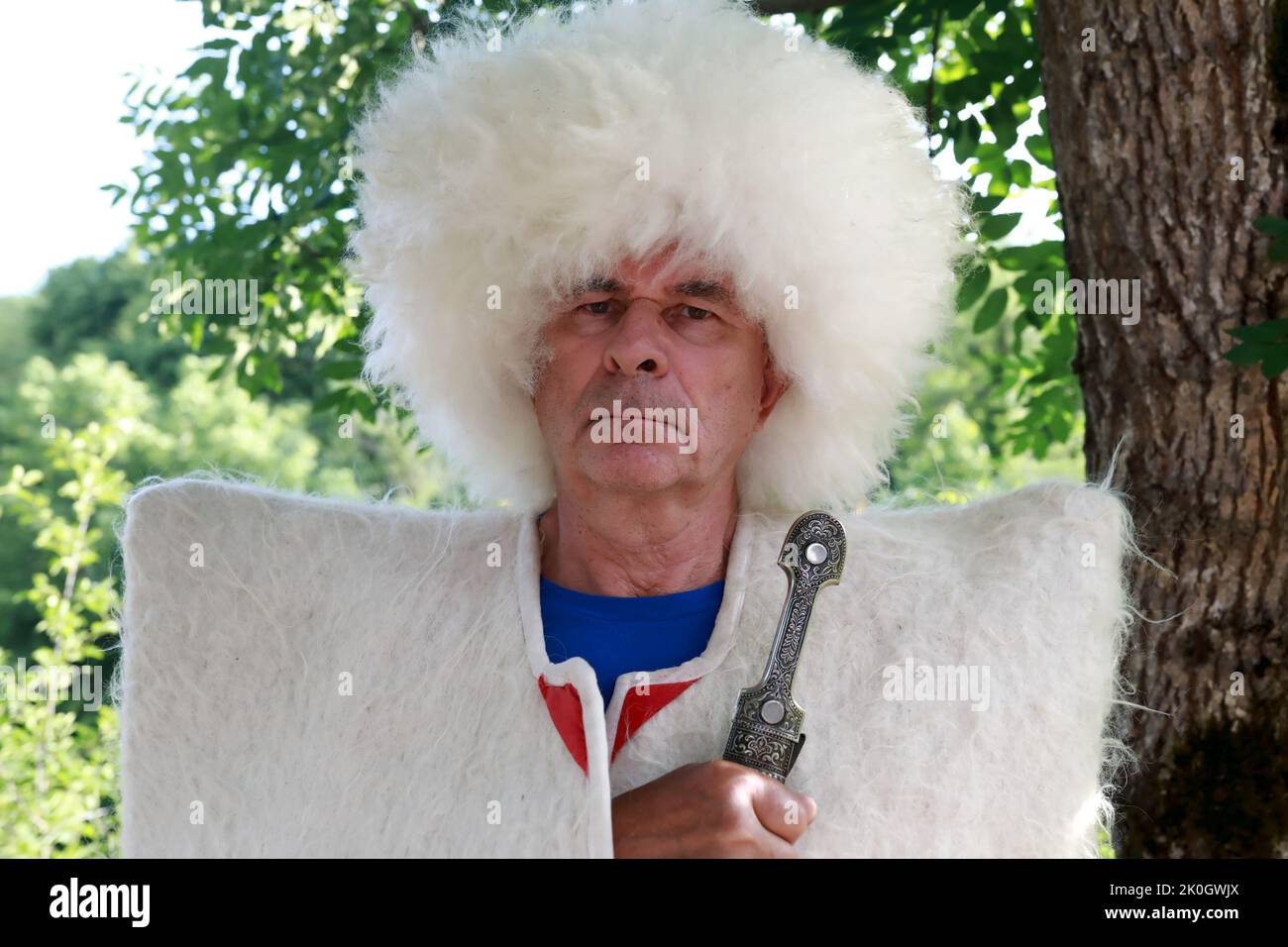 Man in traditional Adyghe clothes in Khadzhokh gorge, Adygea Stock ...