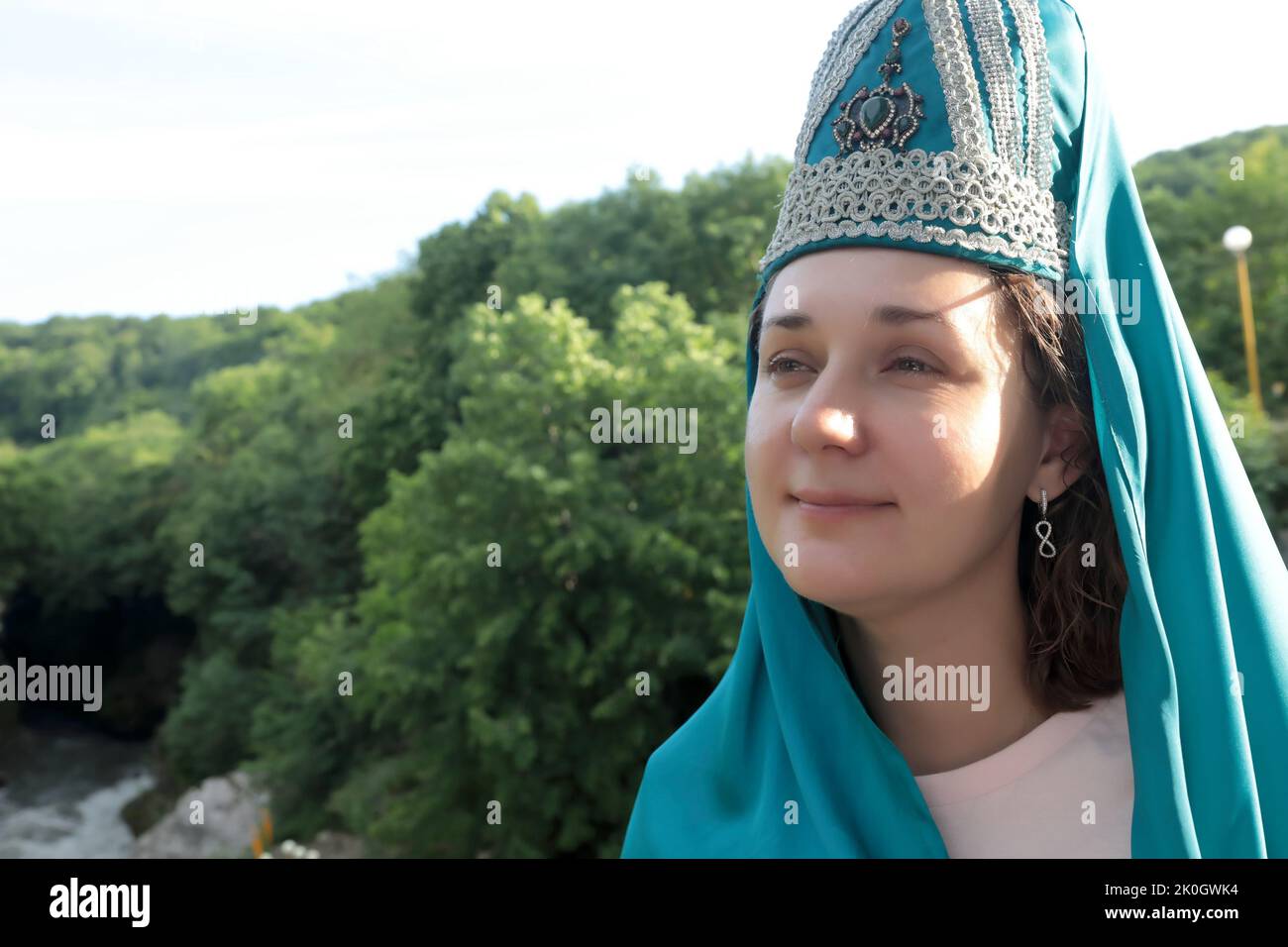 Portrait of woman in traditional Adyghe clothes in Khadzhokh gorge ...