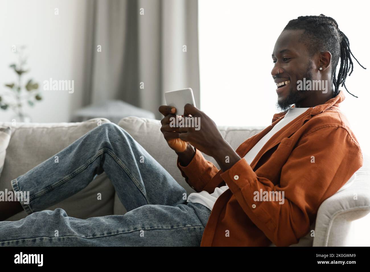 Black man chilling playing hi-res stock photography and images - Alamy