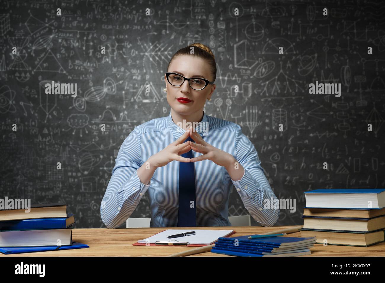 Strict female teacher . Mixed media Stock Photo - Alamy