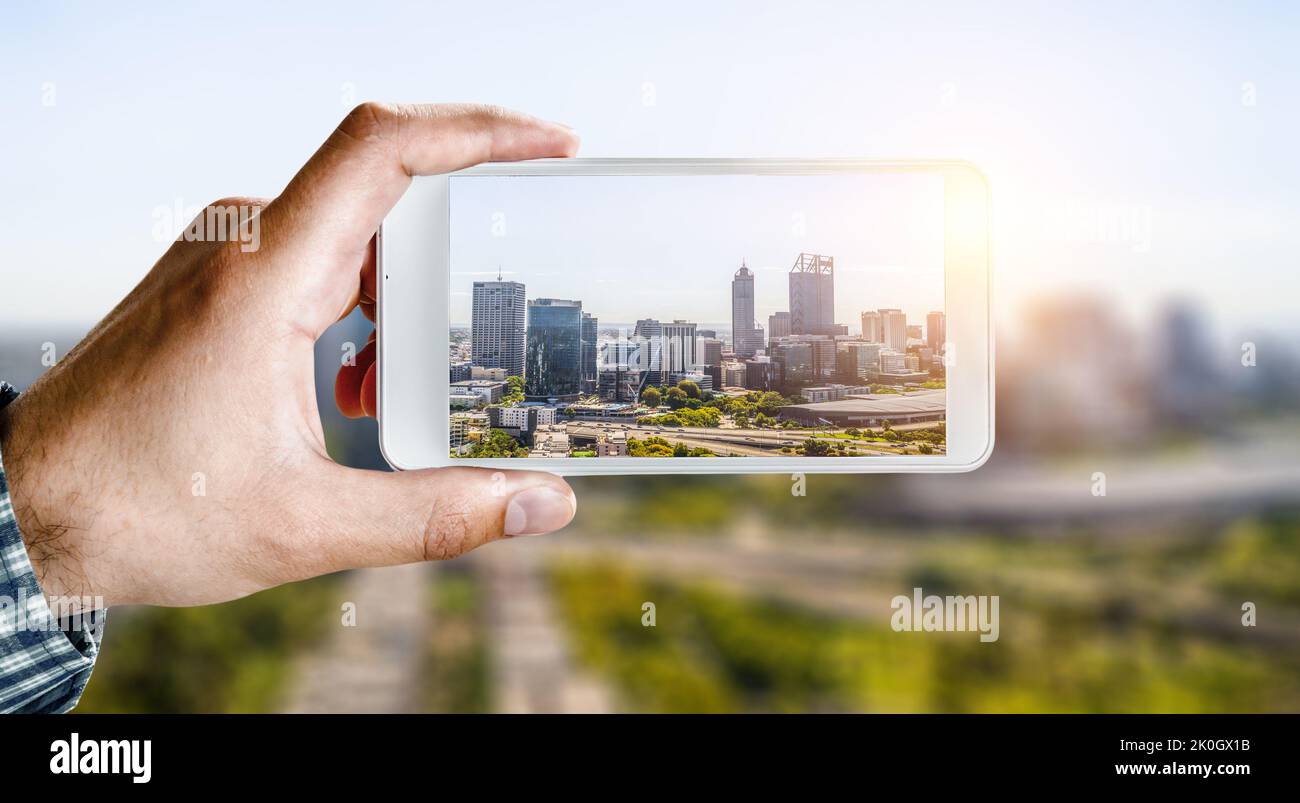Hand holding smartphone mobile . Mixed media Stock Photo - Alamy