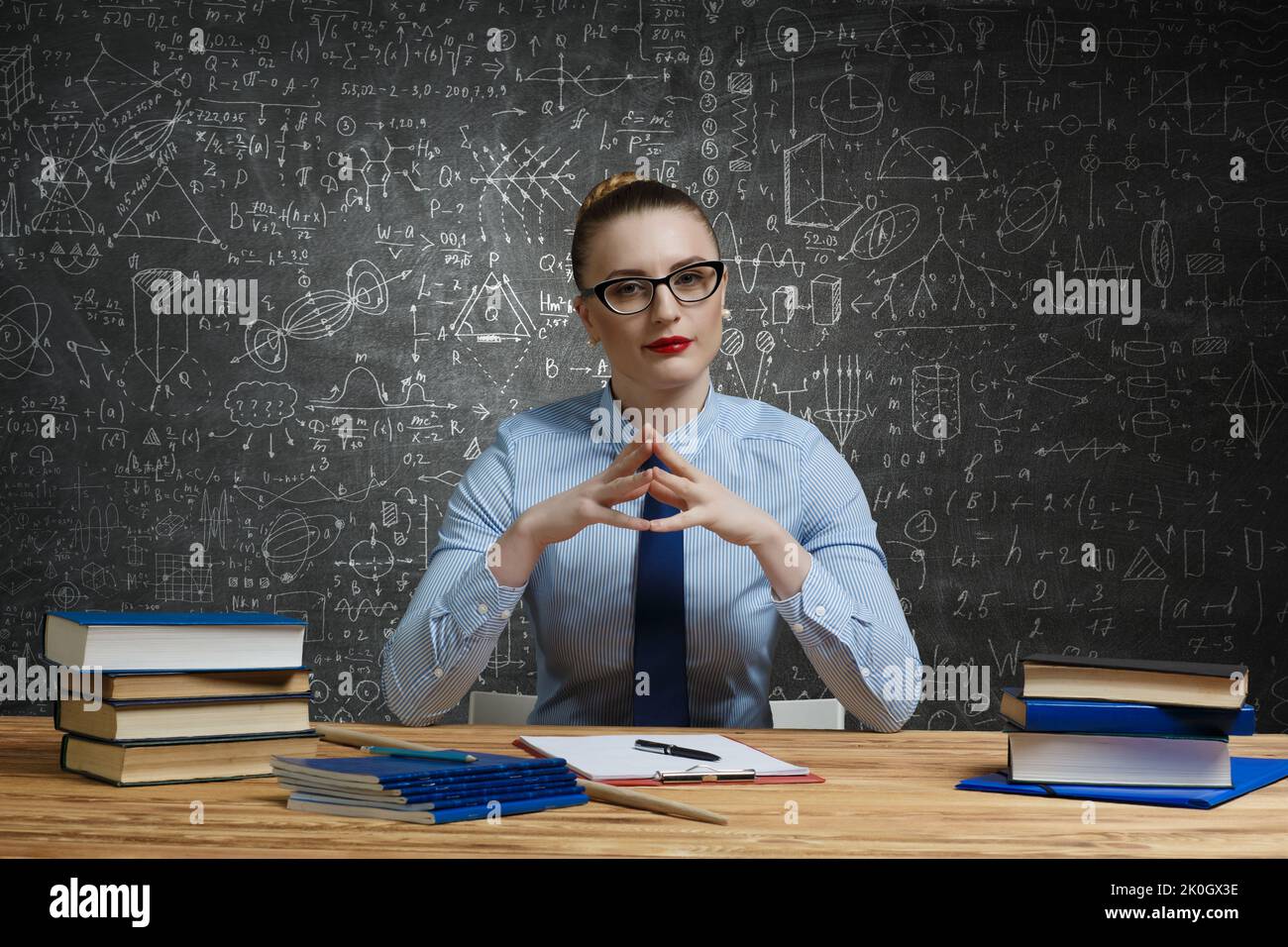 Strict female teacher . Mixed media Stock Photo - Alamy