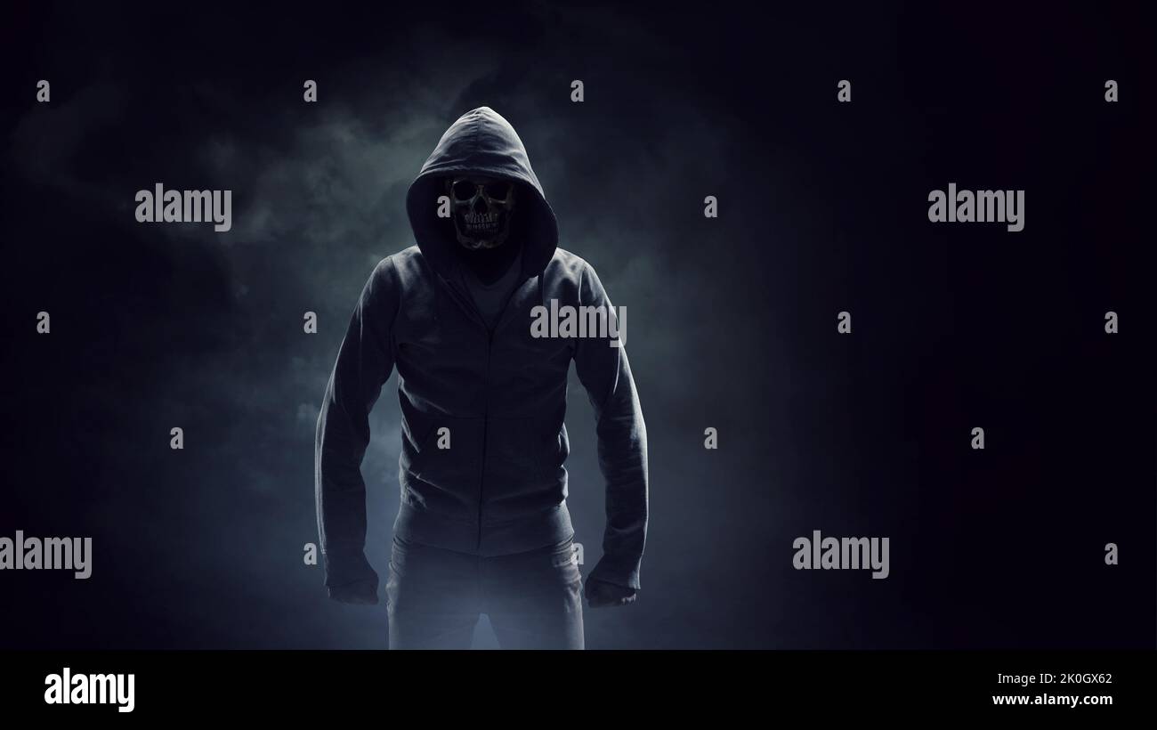 Scary and creepy male monster with gouged eyes looking like a skull ...