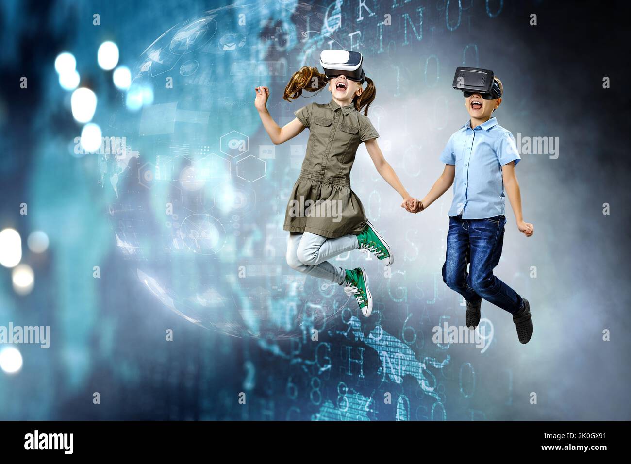 Kids wearing virtual reality goggles Stock Photo - Alamy