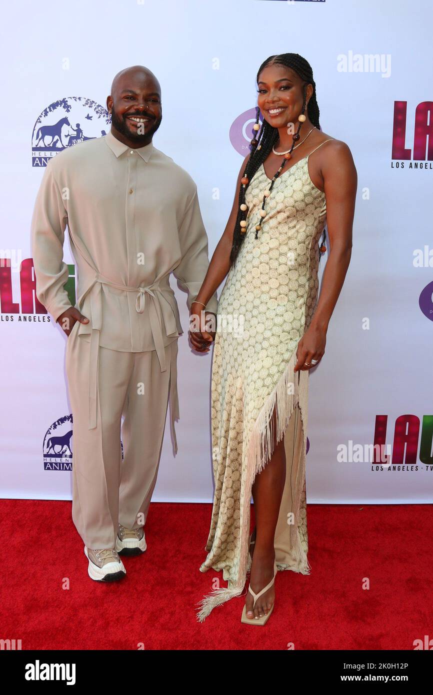 Los Angeles, CA. 11th Sep, 2022. Larry Sims, Gabrielle Union at ...