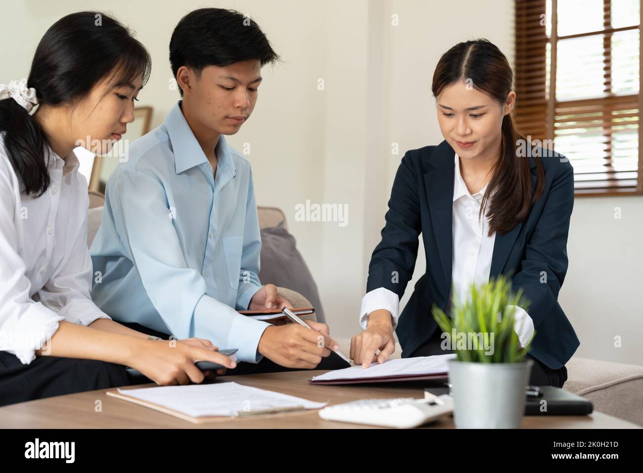 Businessman and partner signing contract on the meeting room Stock ...