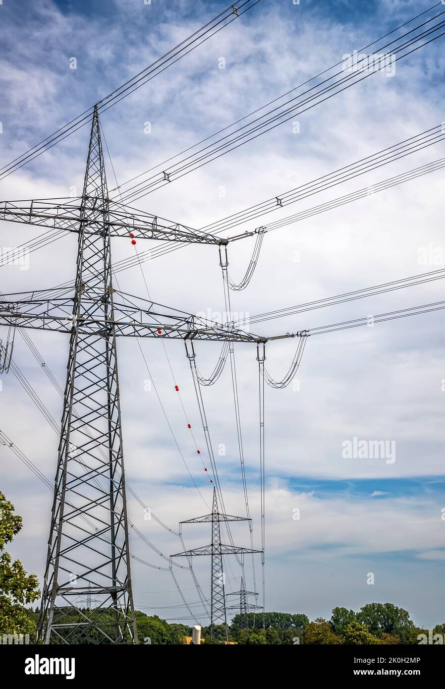 High voltage electric pole and transmission lines. Electricity pylons ...