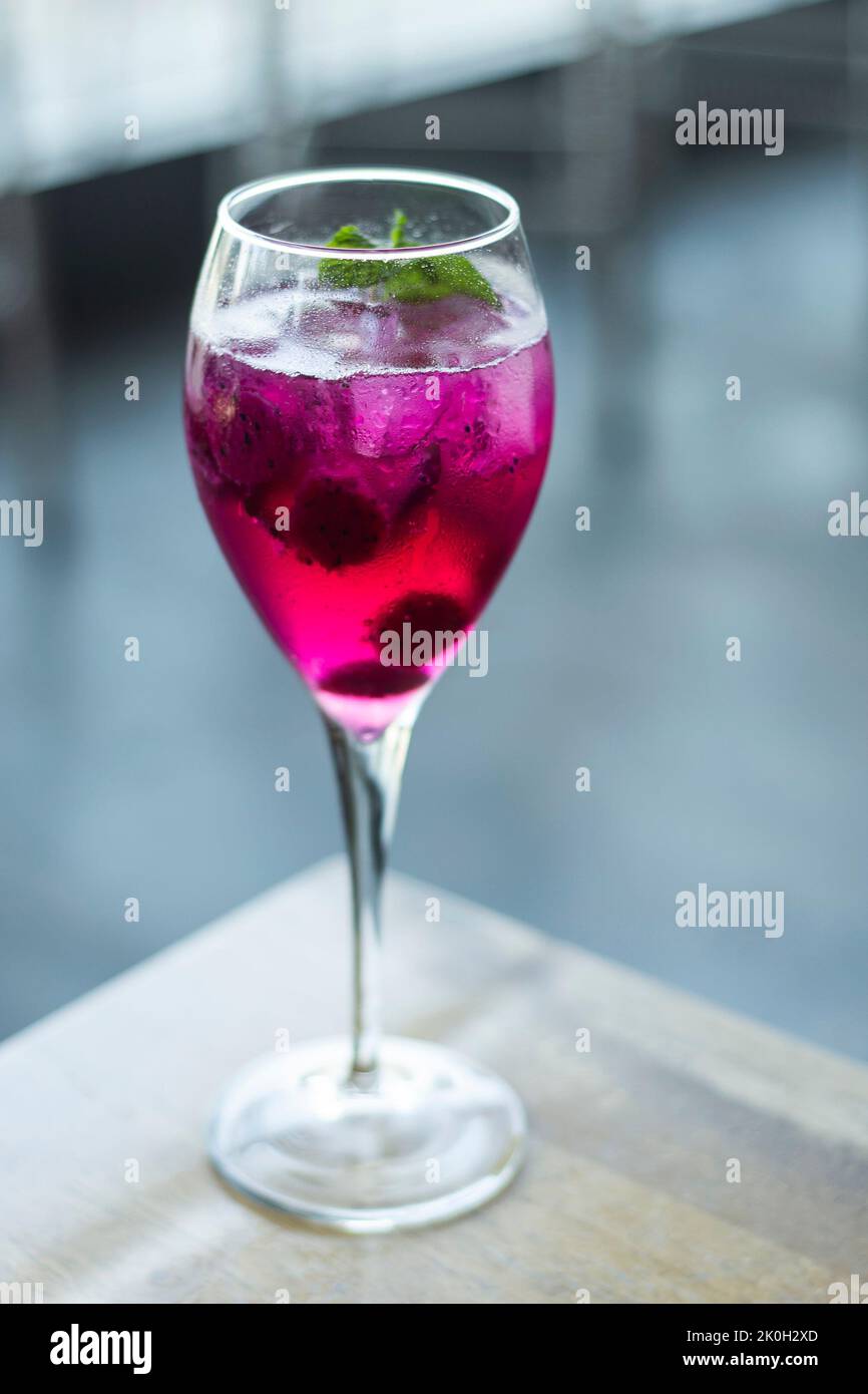 raspberry and red dragon fruit prosecco wine spritzer cocktail Stock ...